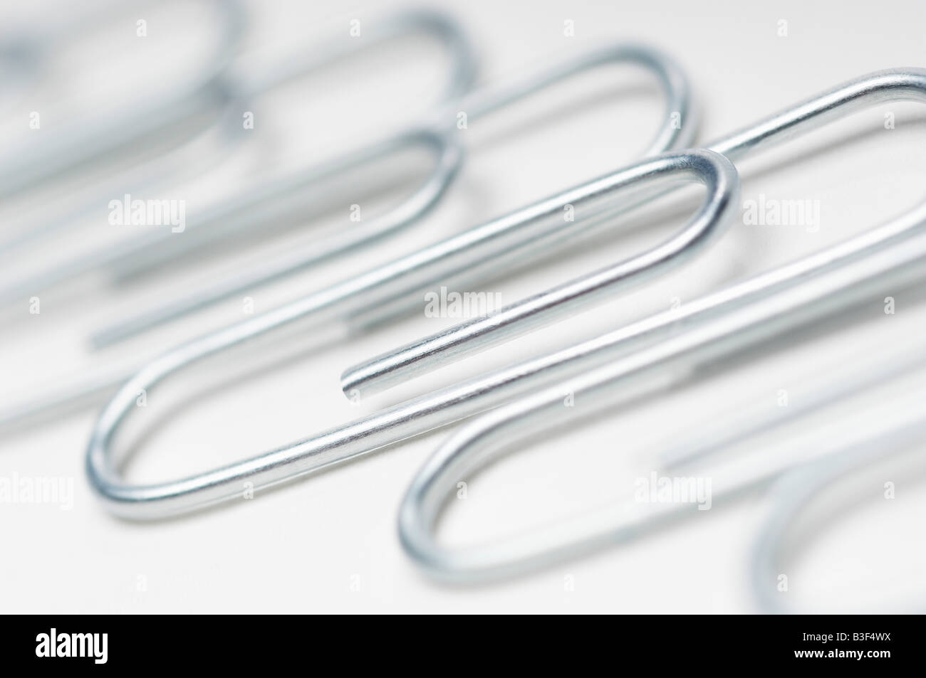 Row of paper clips, close-up Stock Photo - Alamy