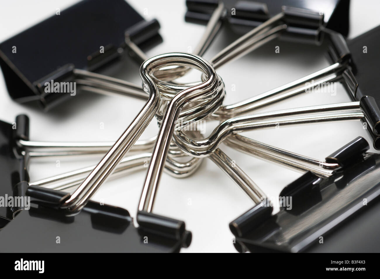 Binder clips, close-up Stock Photo - Alamy
