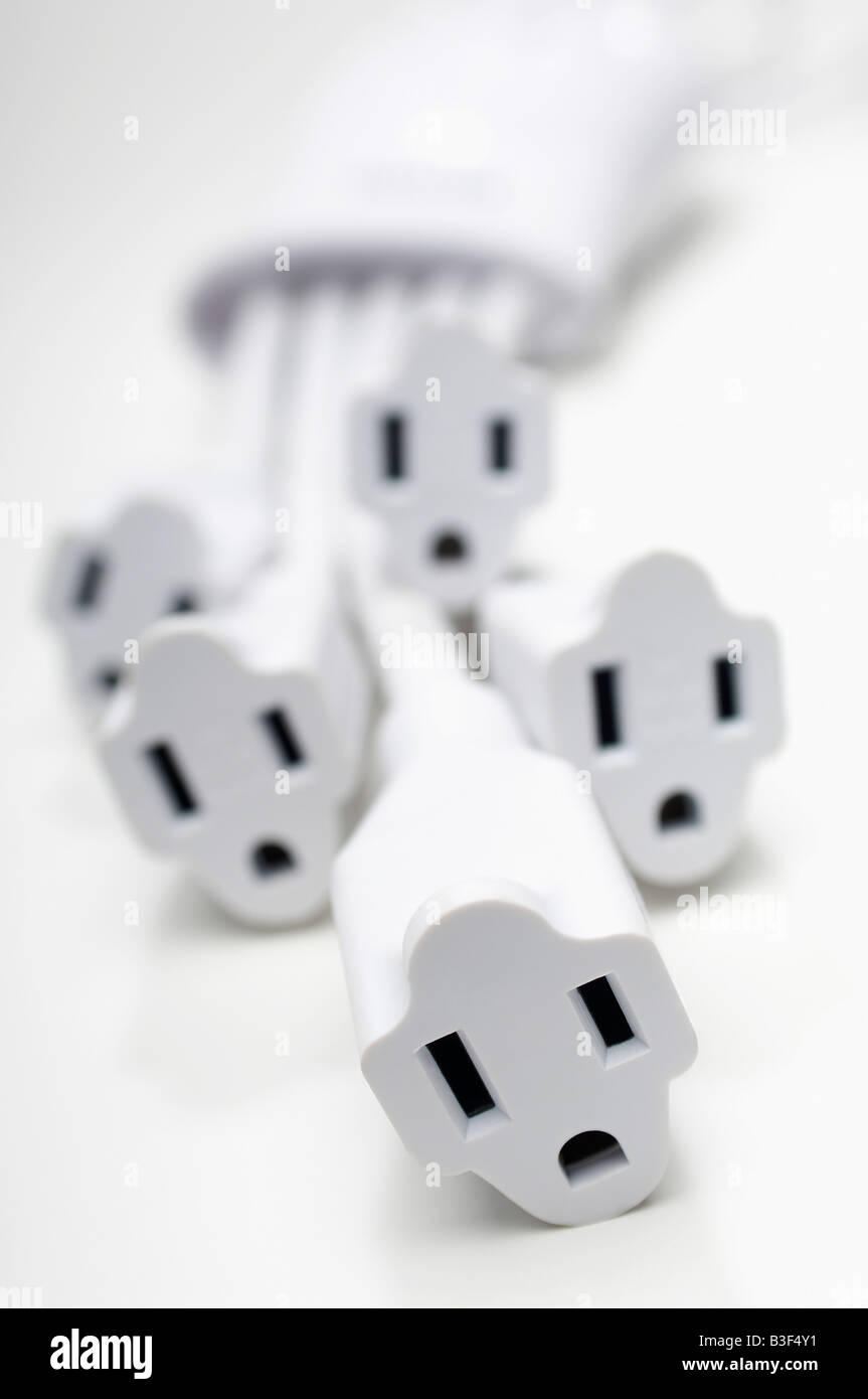 White power extension cords, close-up Stock Photo - Alamy