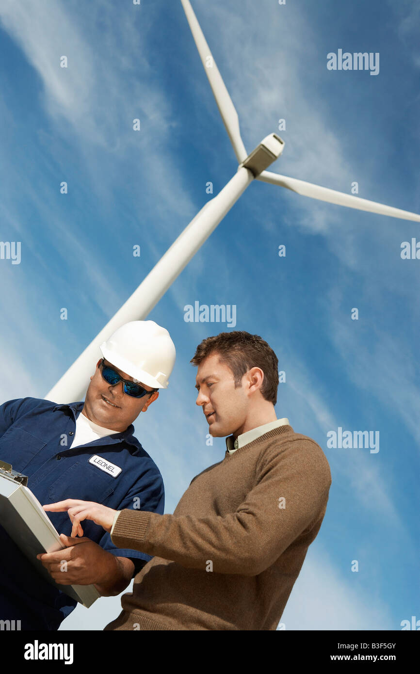 Engineers working at wind farm Stock Photo - Alamy