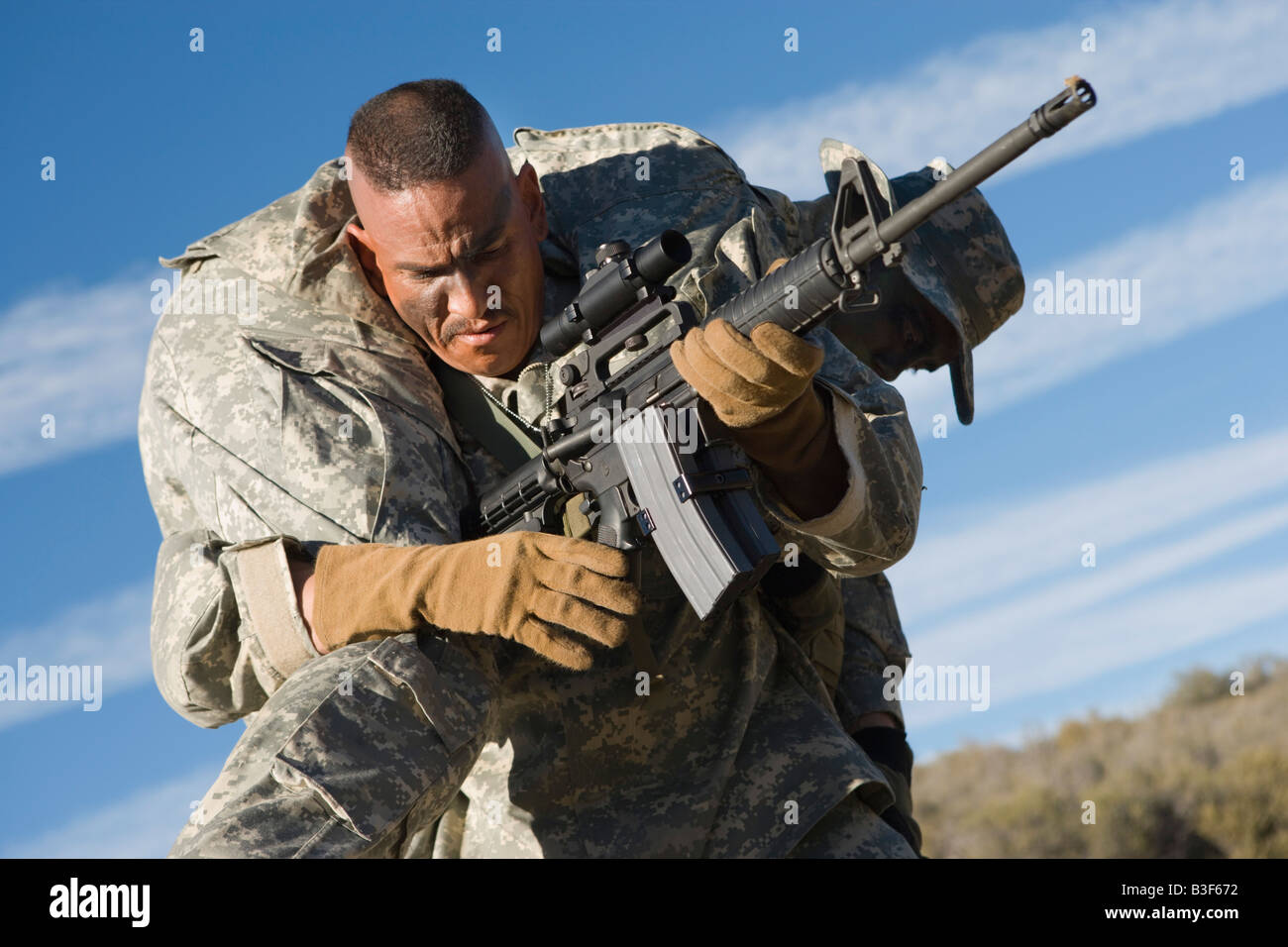 Us army soldier carrying wounded hi-res stock photography and images ...