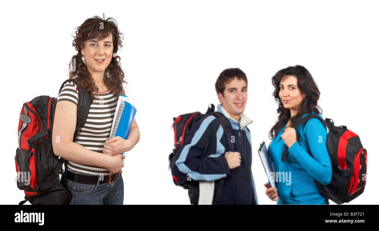 Three students with books and backpacks over a white background Focus ...