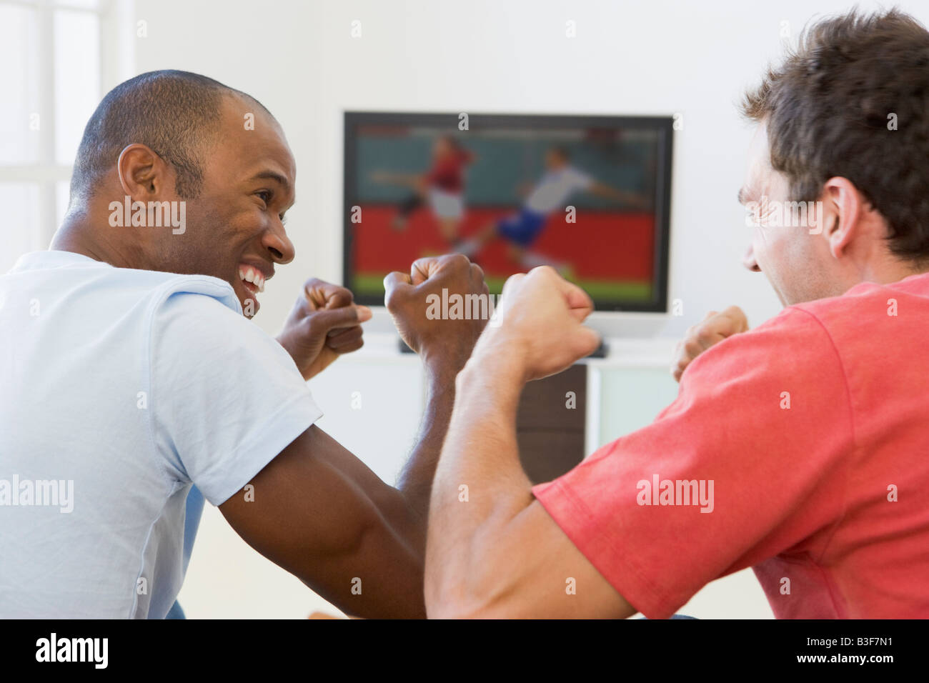 Cheering men hi-res stock photography and images - Alamy