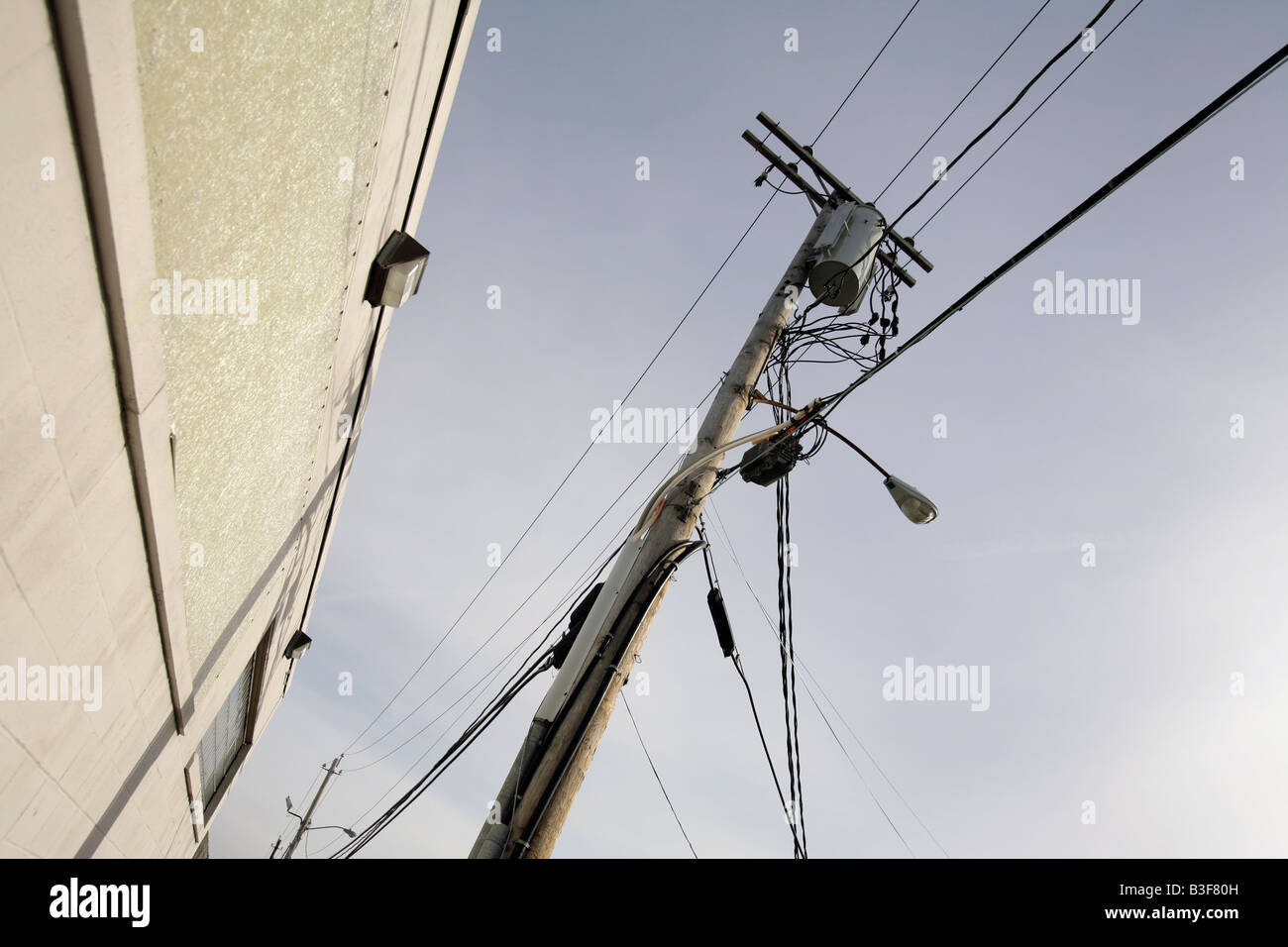 Power lines in an urban environment Stock Photo - Alamy