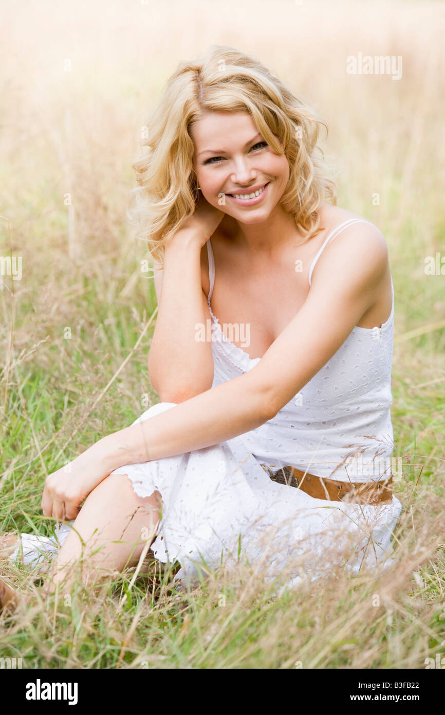 Beautiful woman relaxing sitting hi-res stock photography and images ...