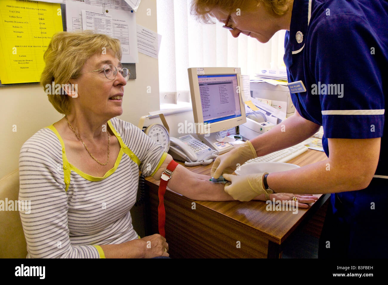 OLDER WOMAN AGE 60s HAVING BLOOD TEST UK Stock Photo - Alamy