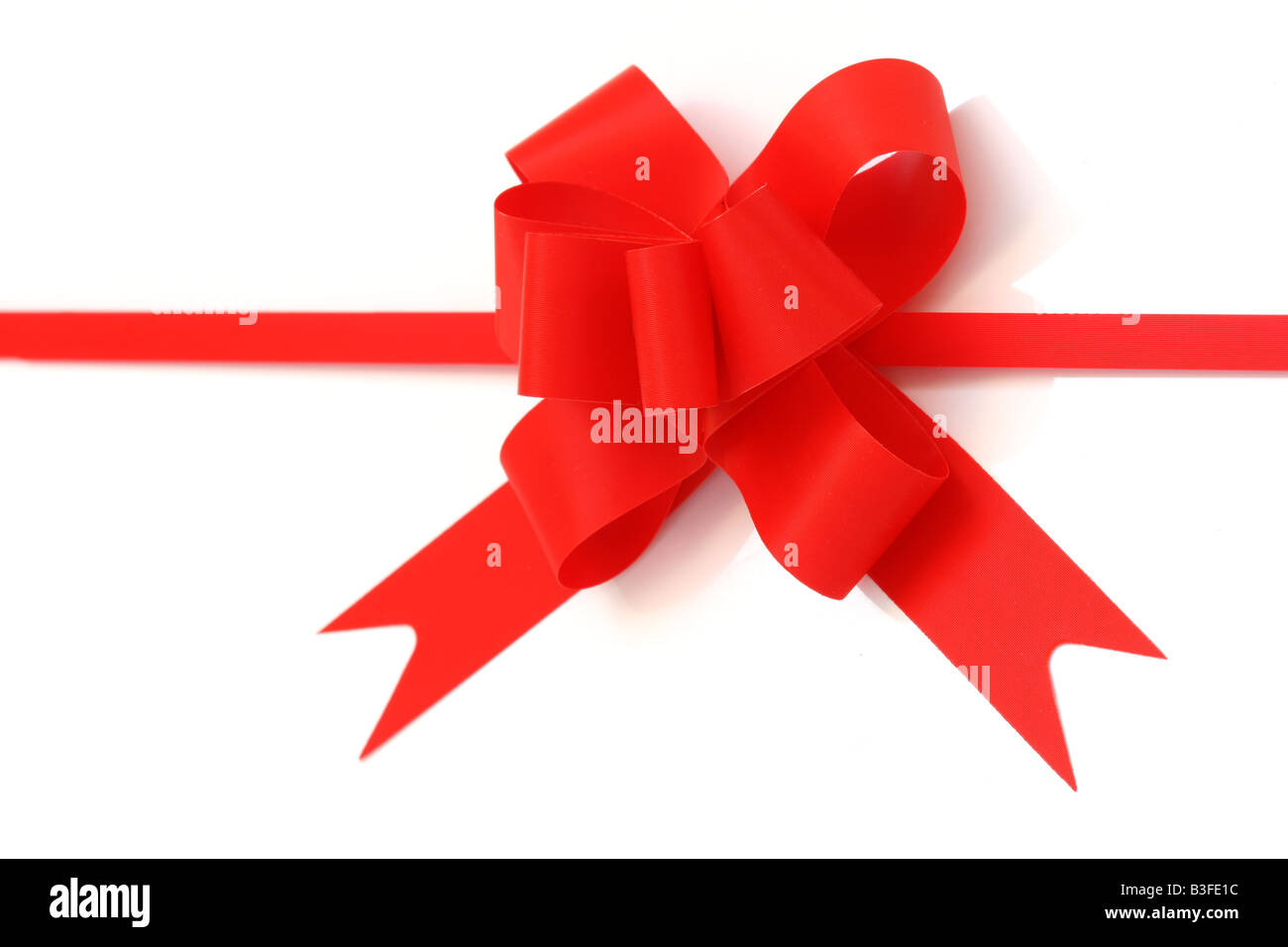 red gift bow and ribbon isolated on white background Stock Photo - Alamy