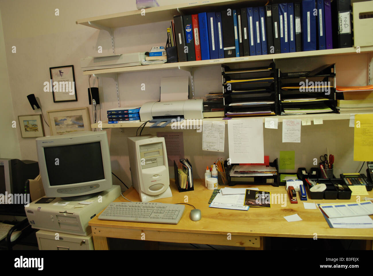 computers and binders in art gallery office Stock Photo - Alamy