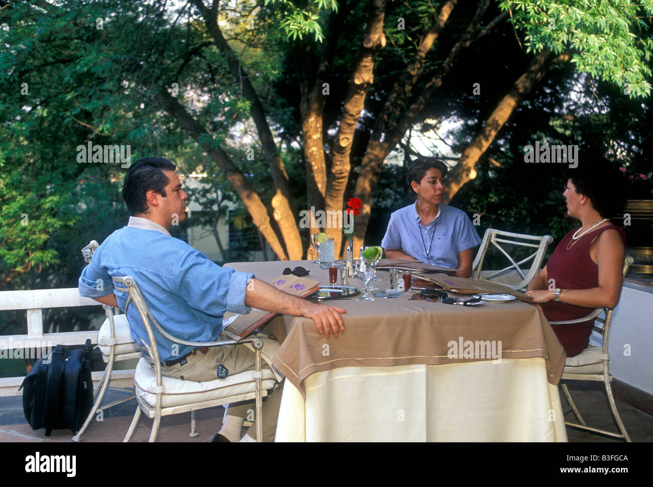 3, three, Mexicans, man, women, restaurant, Hosteria Las Quintas Resort ...