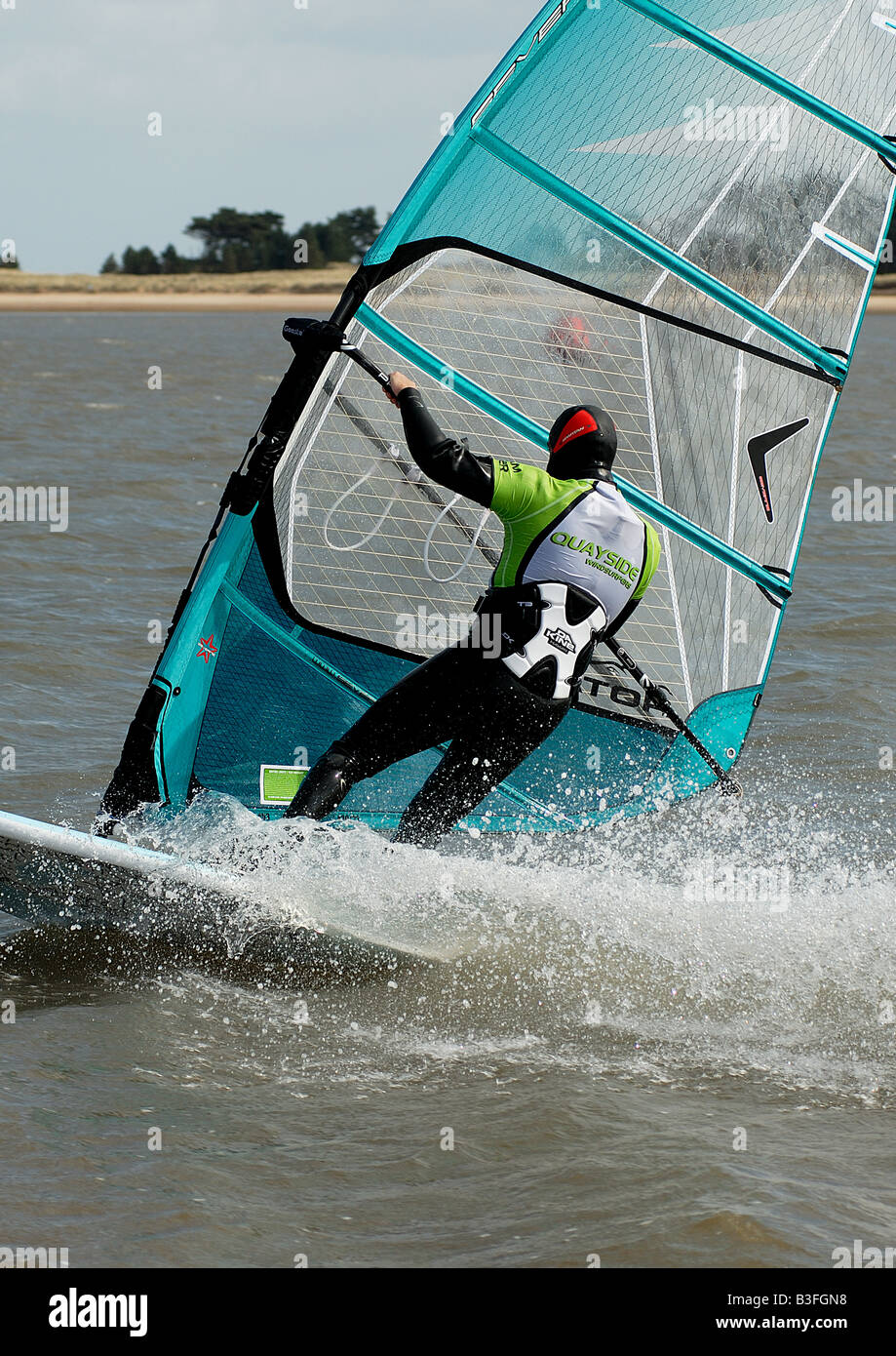 Windsurfer carve-gybing at Wells, North Norfolk Stock Photo - Alamy