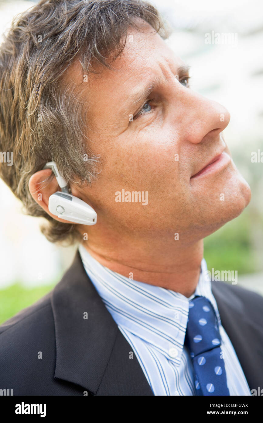 Wearing earpiece hi-res stock photography and images - Alamy