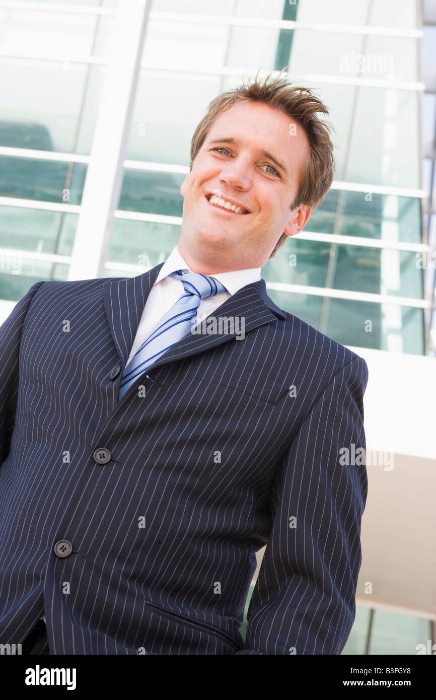 Businessman outdoors building standing hi-res stock photography and ...