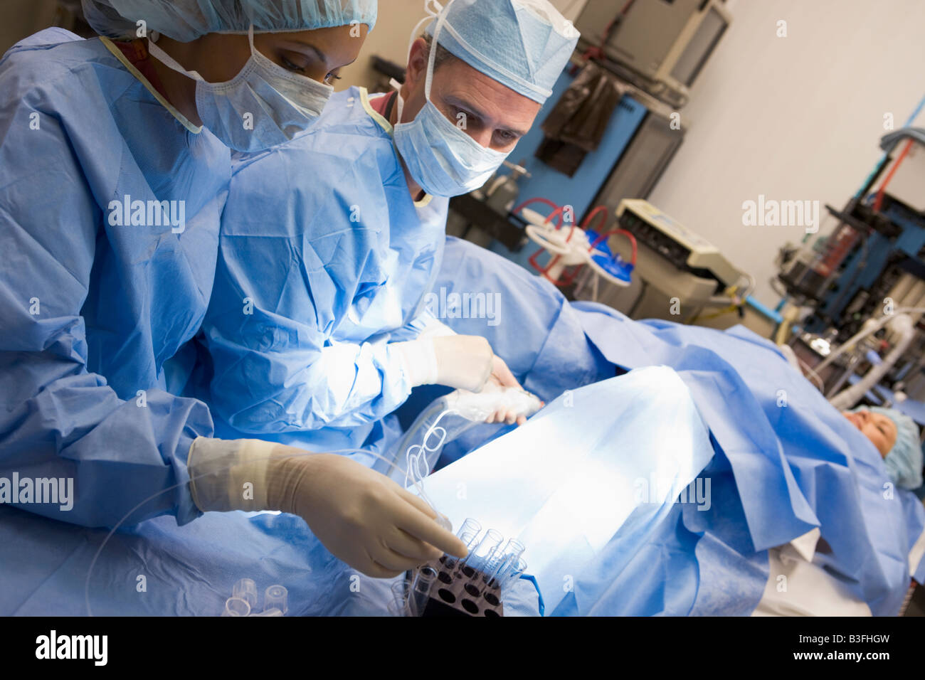 Woman in operating room undergoing egg retrieval procedure Stock Photo ...