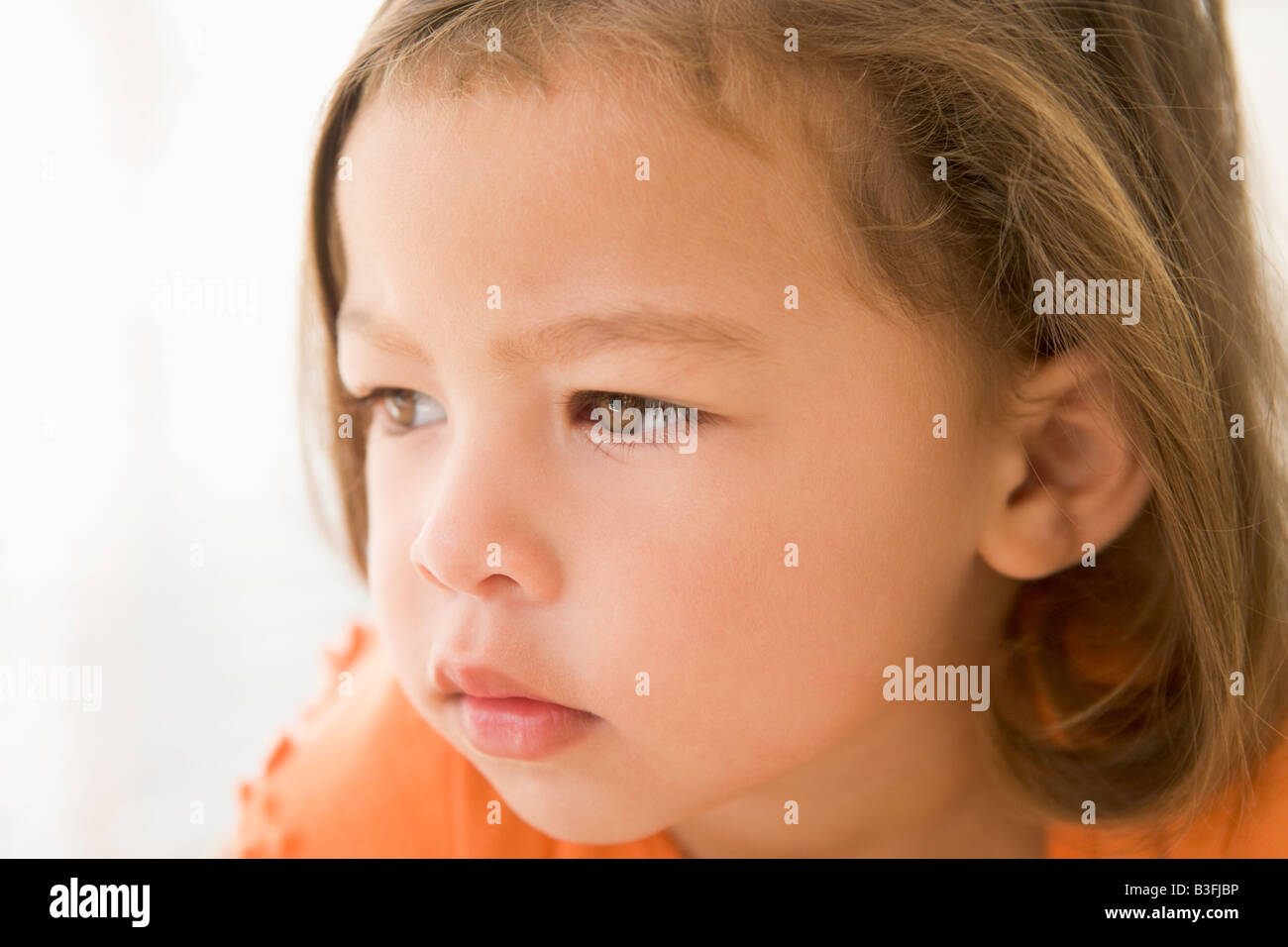 Young girl indoors Stock Photo - Alamy