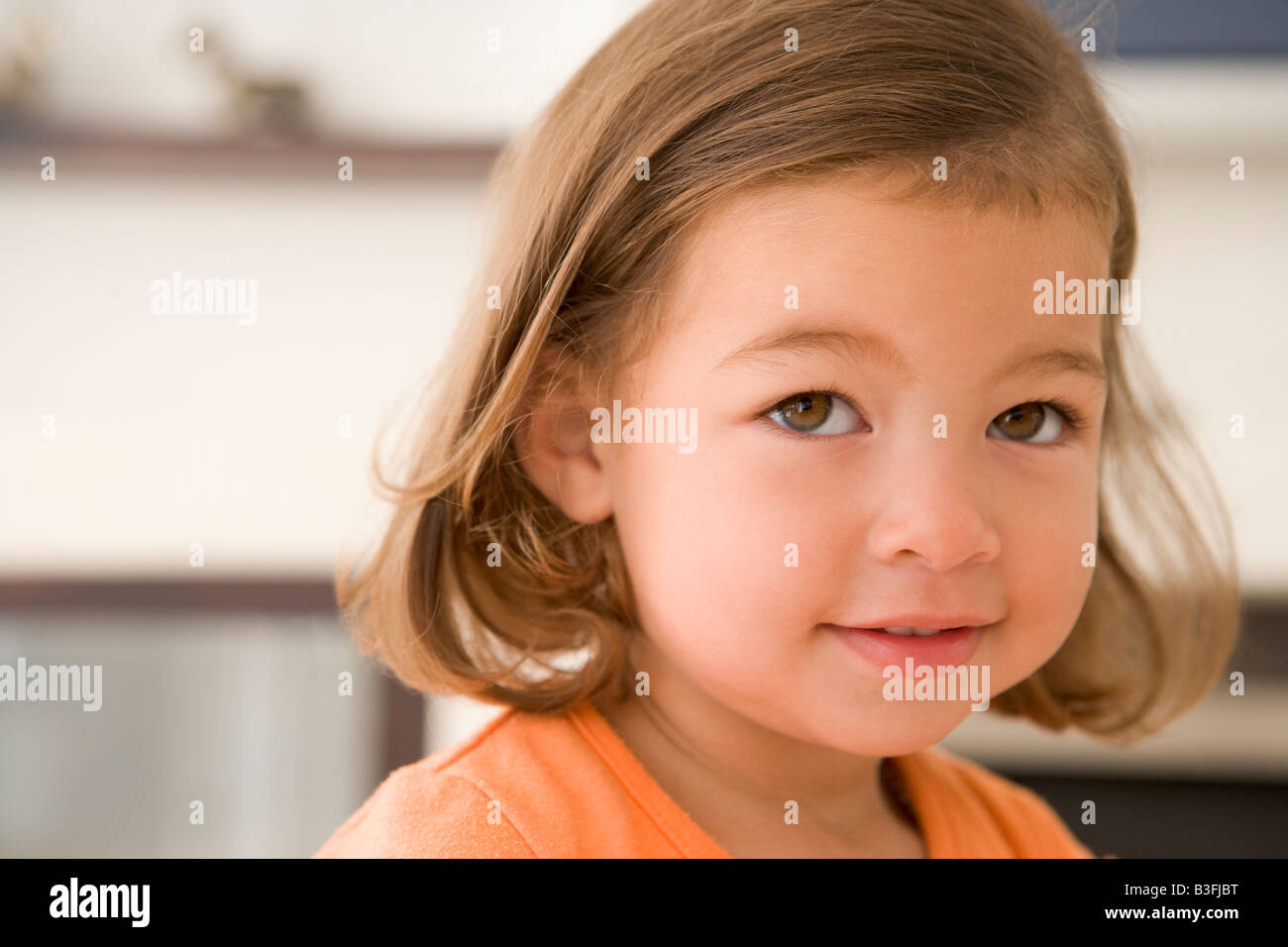 Young girl indoors Stock Photo - Alamy