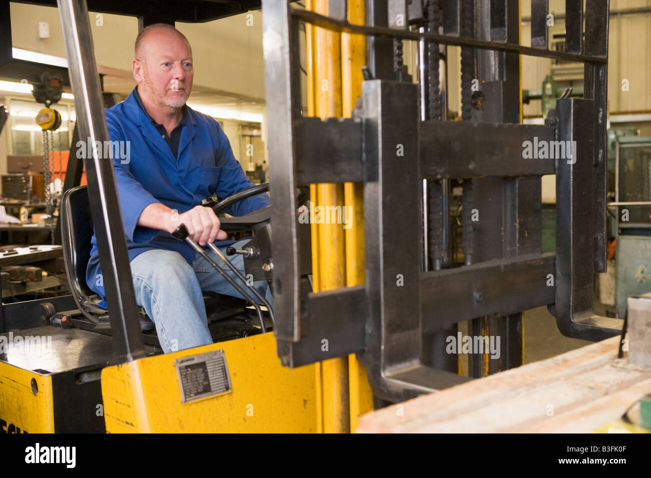 Forklift truck in warehouse full hi-res stock photography and images ...