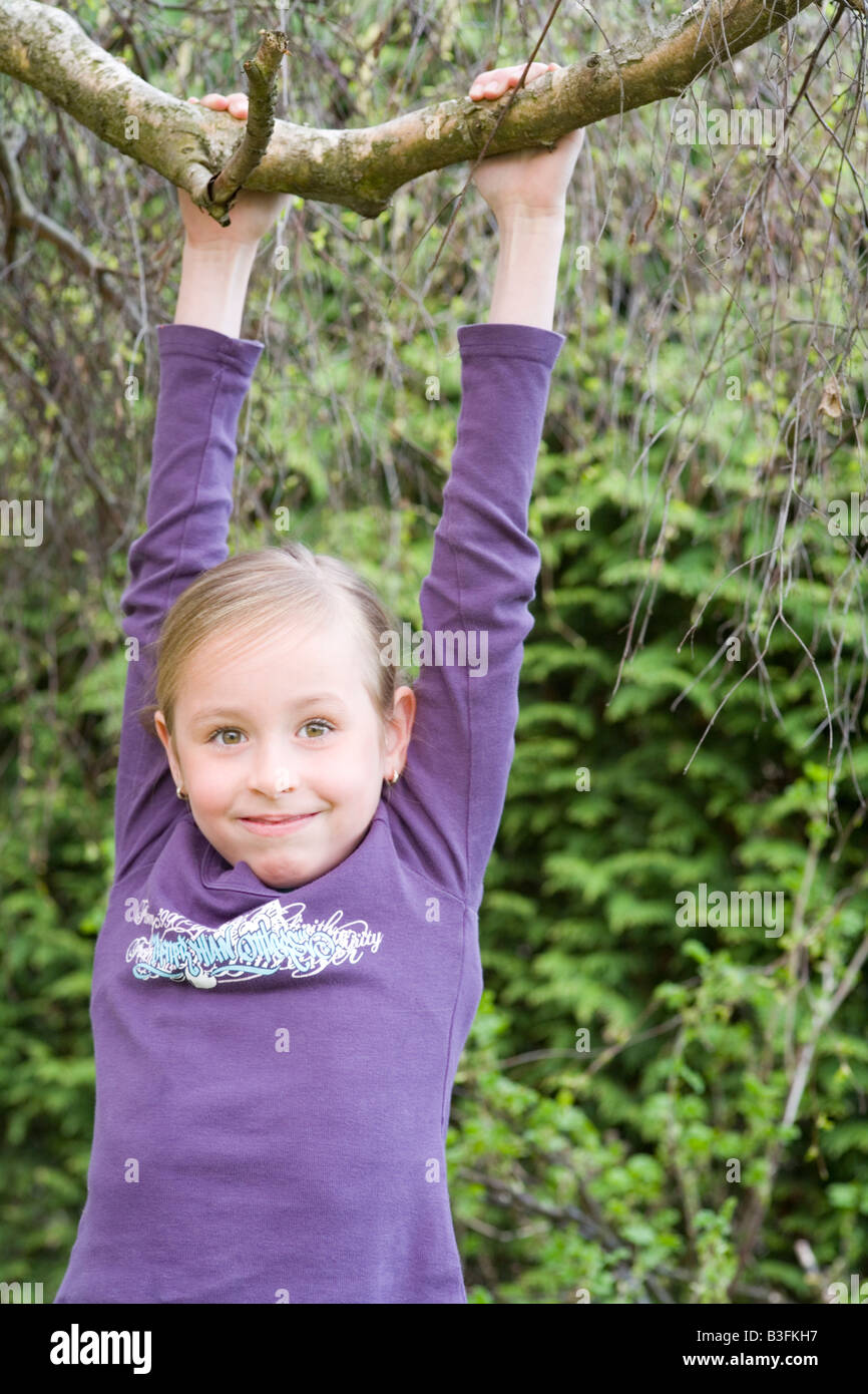 girl on the tree Stock Photo - Alamy