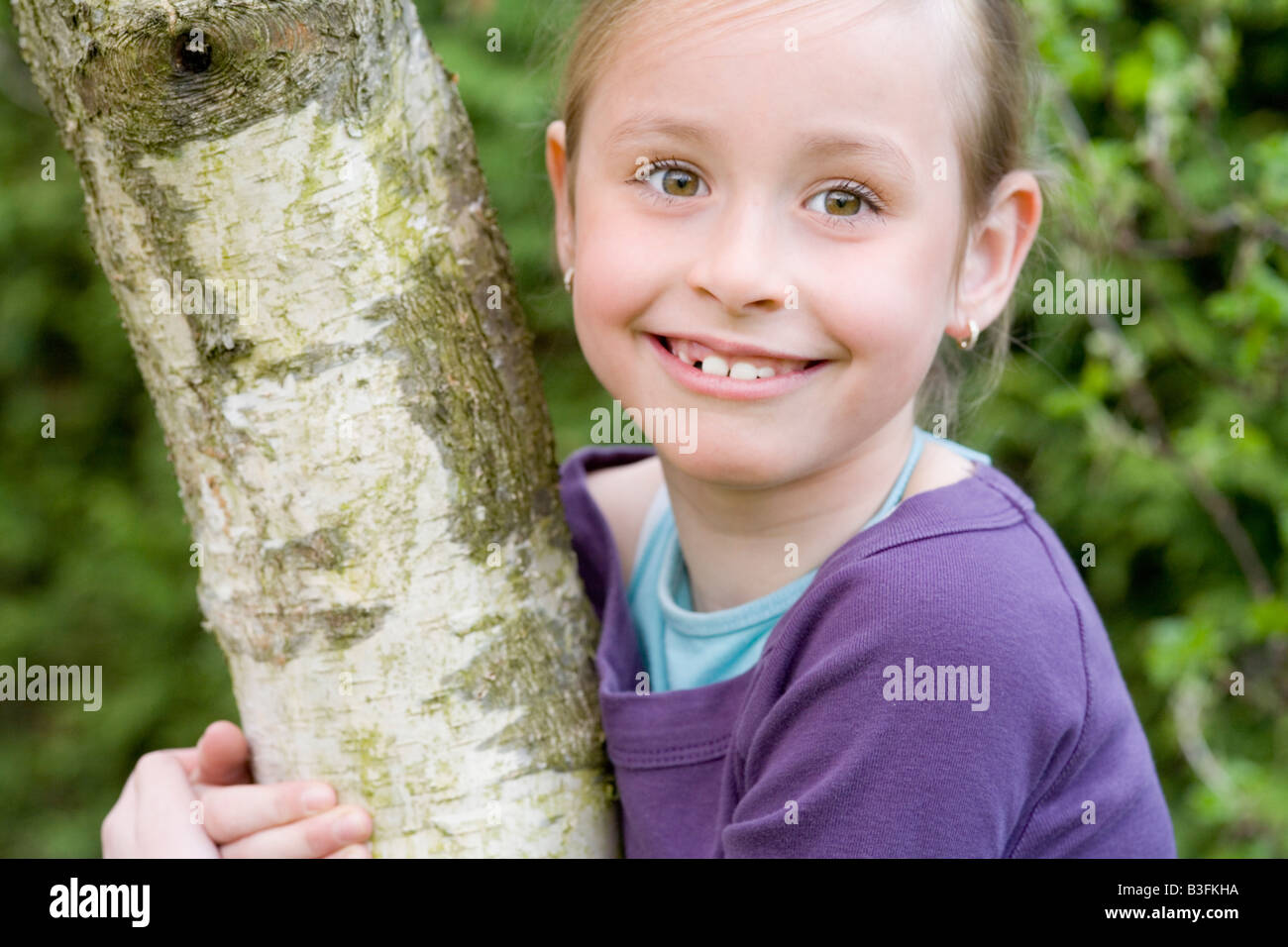 girl with tree Stock Photo - Alamy