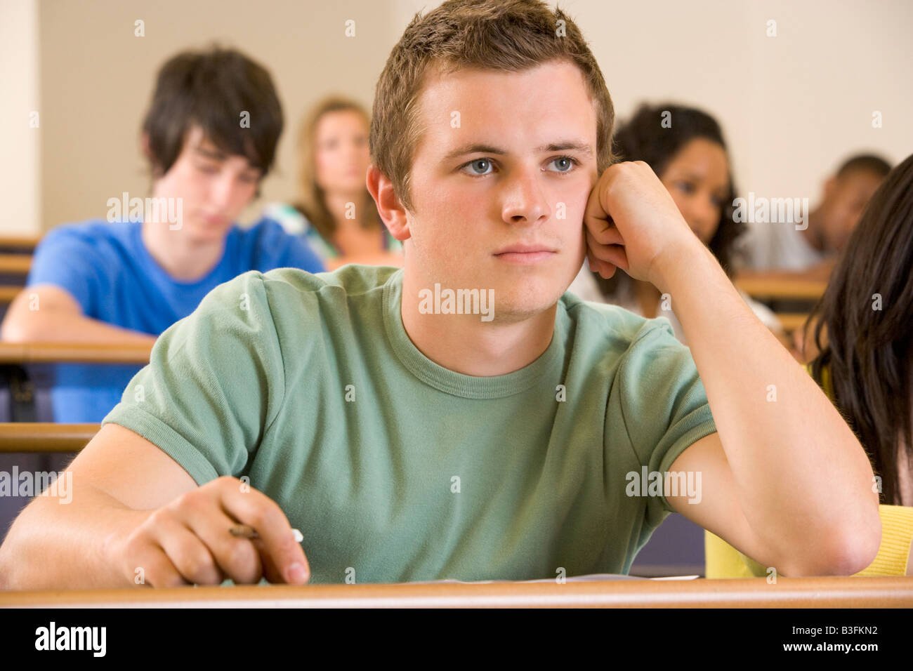 Student in class bored (selective focus Stock Photo - Alamy