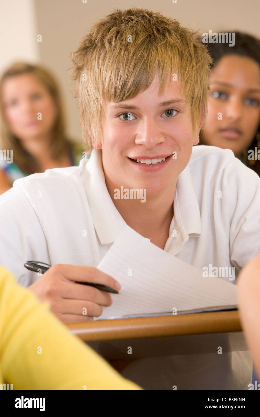 Student in class taking notes (selective focus Stock Photo - Alamy
