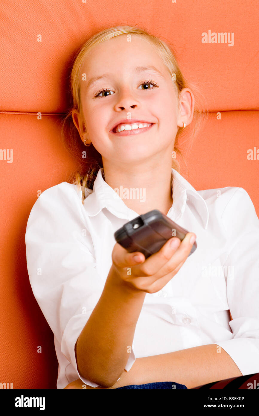 girl with remote Stock Photo - Alamy