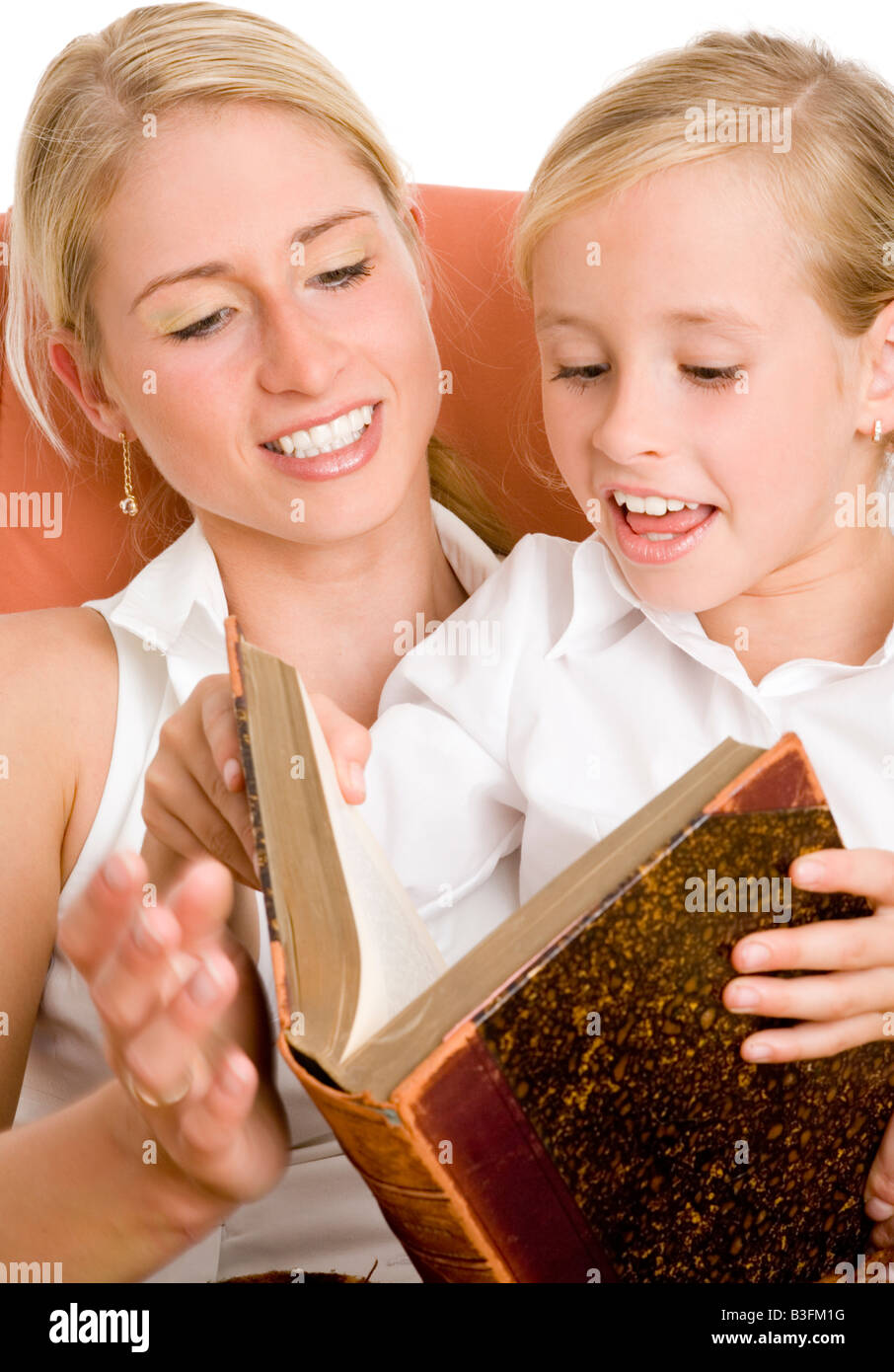 mother and child reading book Stock Photo - Alamy