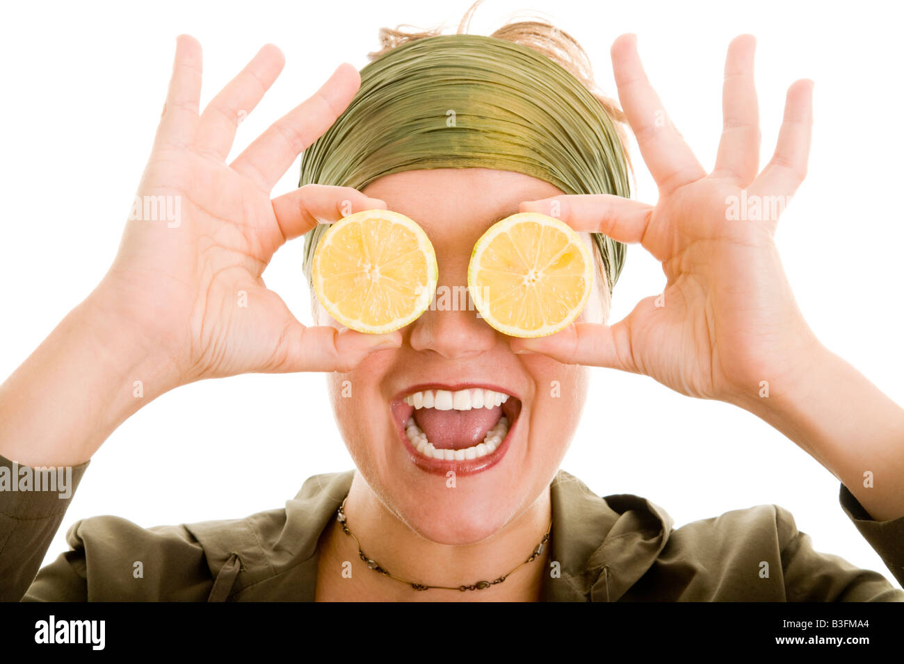 laughing woman with lemon at the eyes Stock Photo - Alamy
