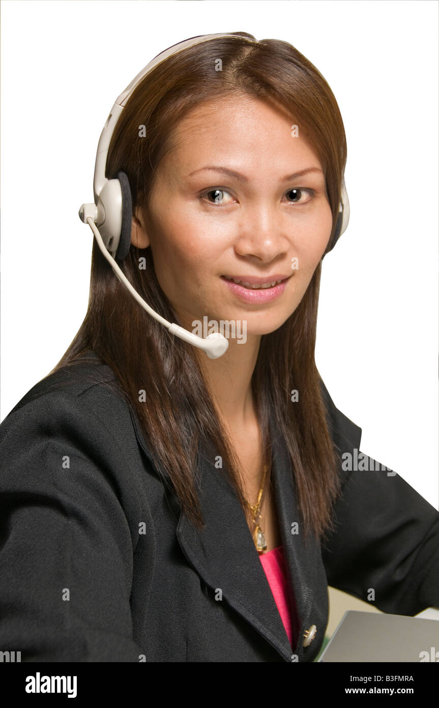 attractive young Asian woman with headset Stock Photo - Alamy