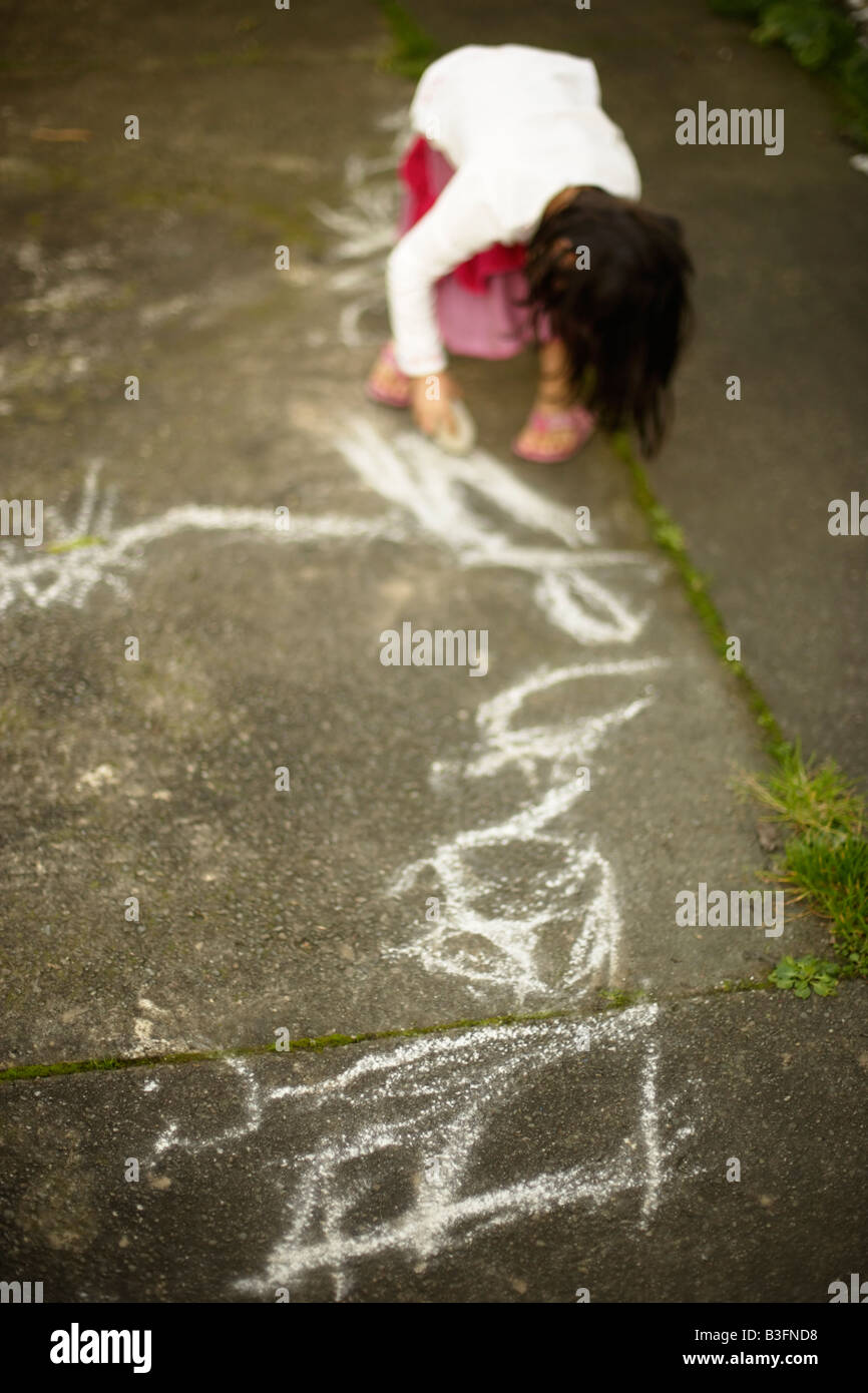 Eleanor writes her name Five year old girl uses volcanic pumice rock to ...