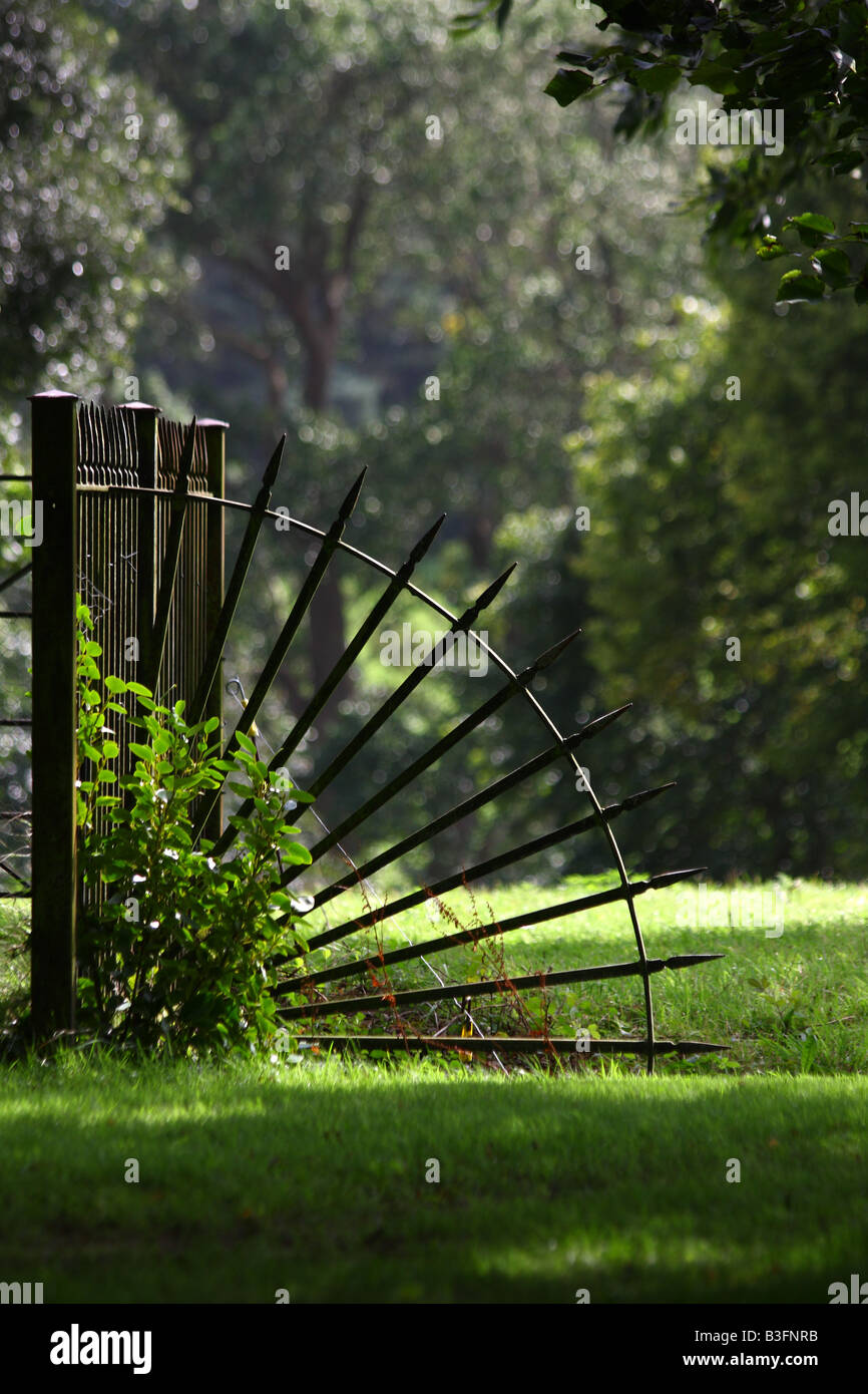 By the fence Stock Photo - Alamy