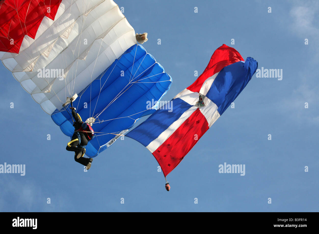 Parachute jumper with Dominican flag during a military parade on the ...