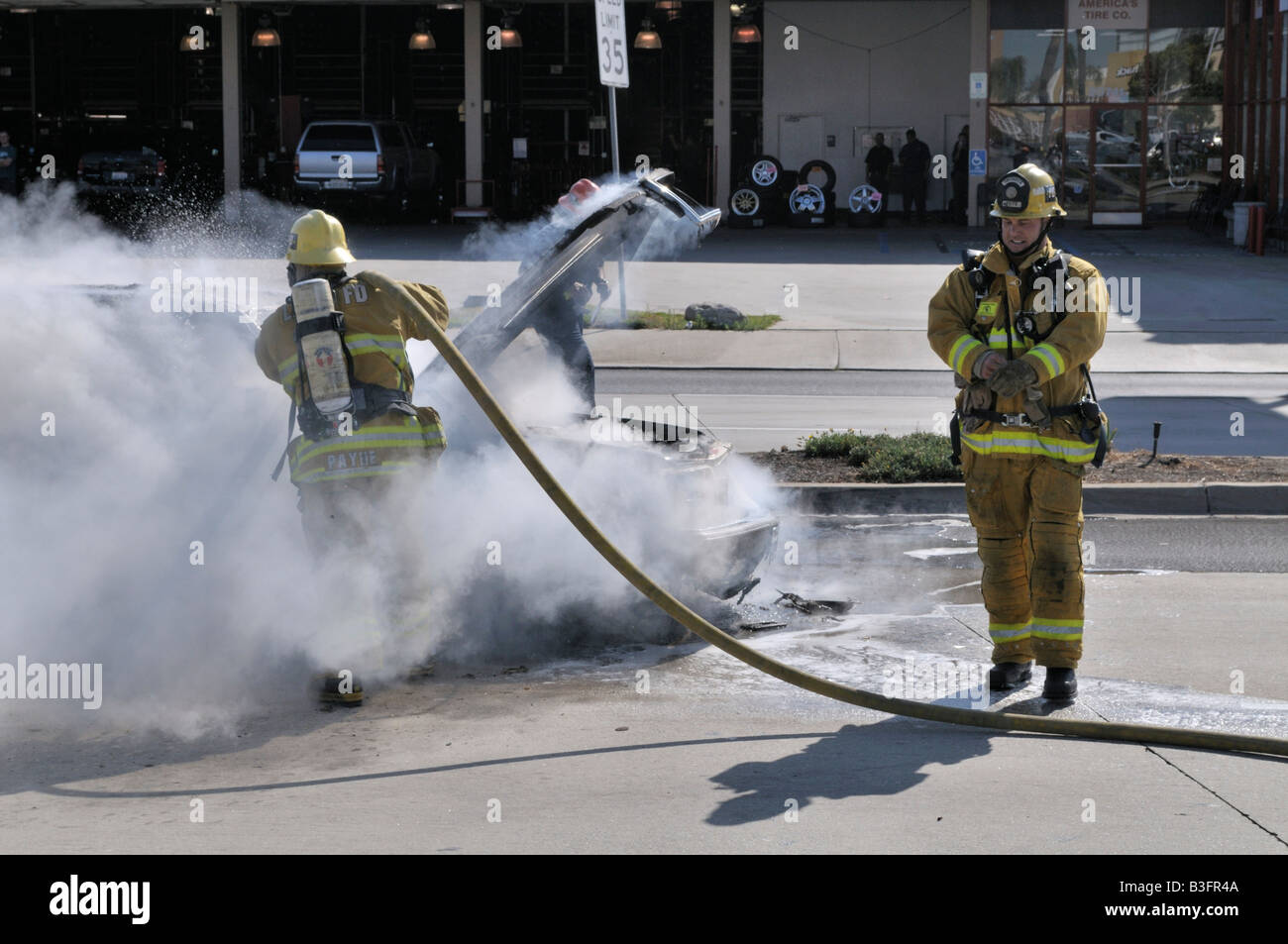 Putting out fire hi-res stock photography and images - Alamy
