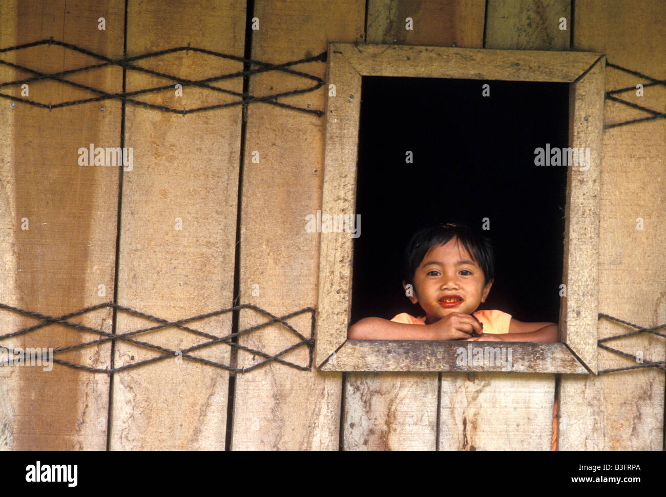 karo batak girl at front window dokan village sumatra indonesia Stock ...
