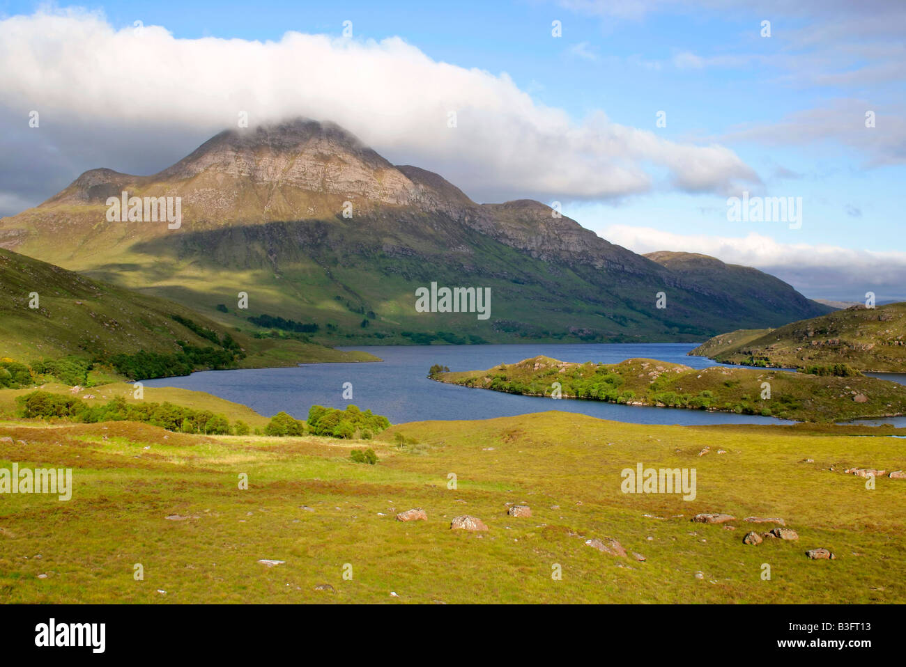 Mountain scenery Loch Lurgainn and Cul Beag with it s summit enveloped ...