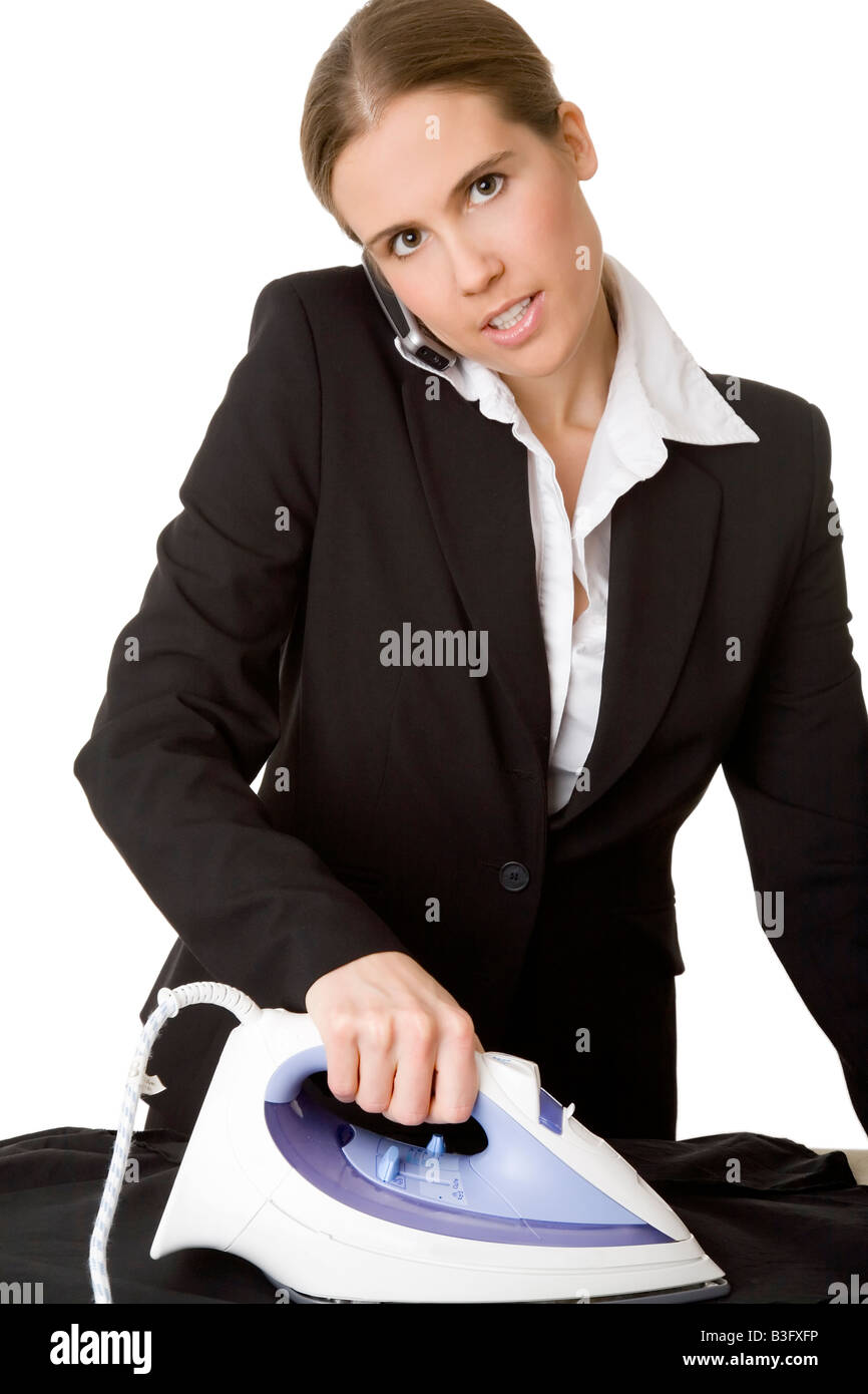 Multitasking woman ironing hi-res stock photography and images - Alamy
