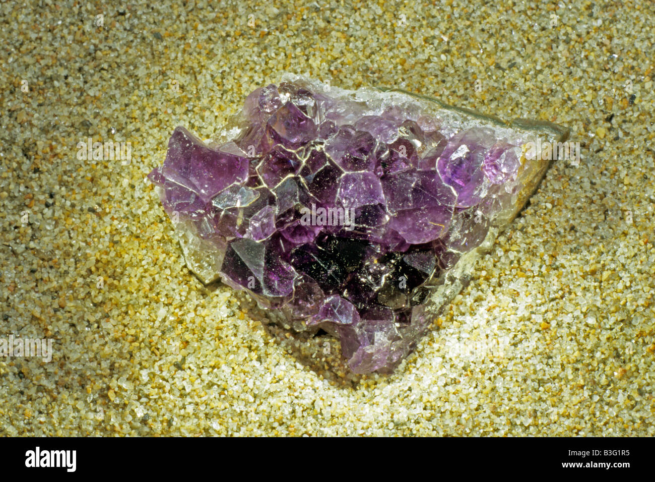 Amethyst, crystals on sand Stock Photo - Alamy