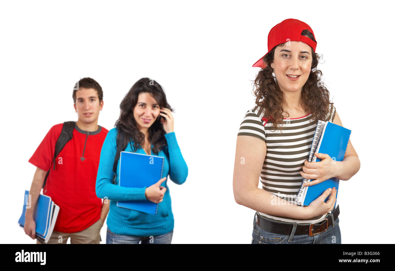 Three students with books and backpacks over a white background Focus ...