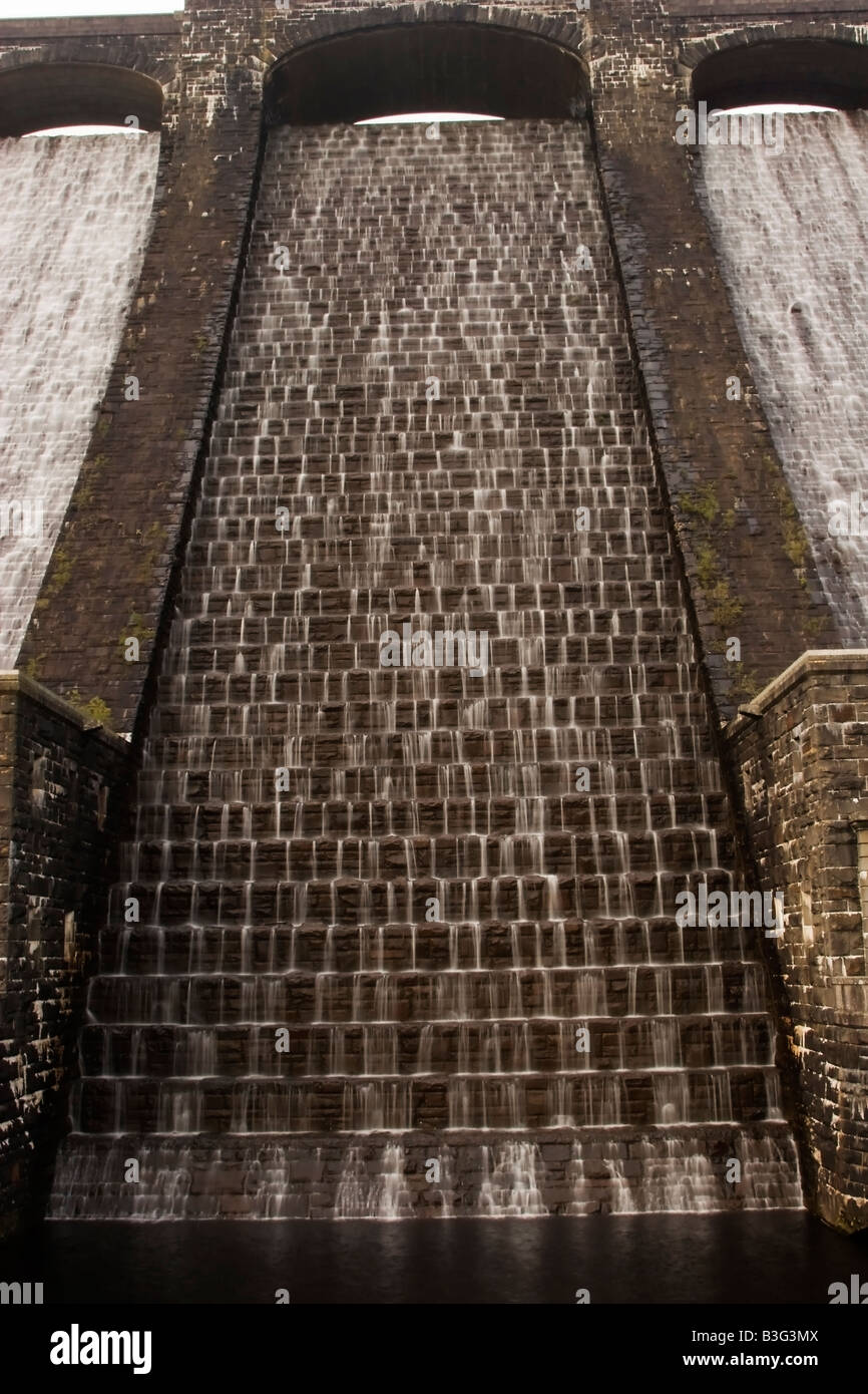 Claerwen Dam in Elan Valley, Wales, with water spilling over top Stock ...