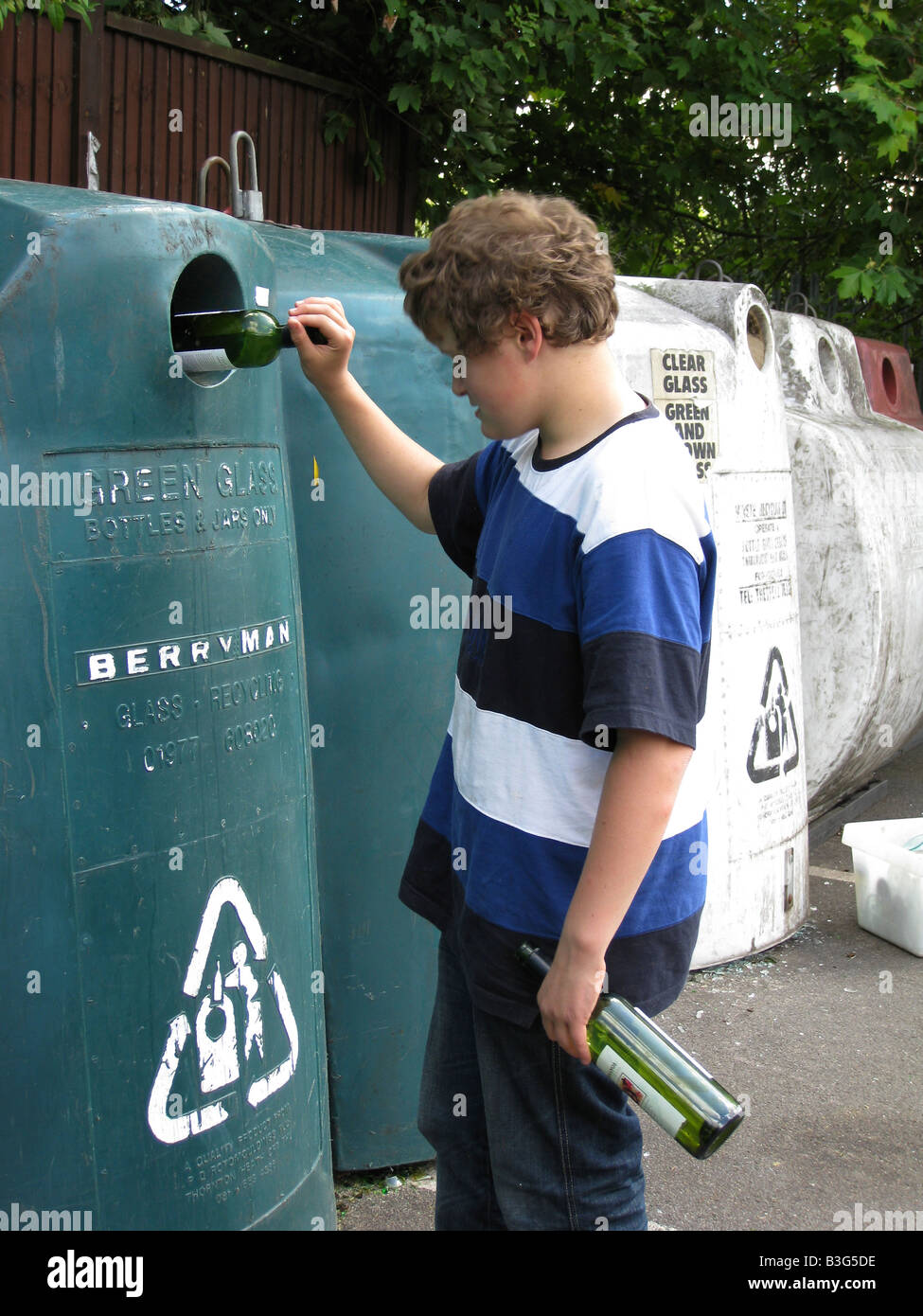 Children recycling glass bottles hi-res stock photography and images ...