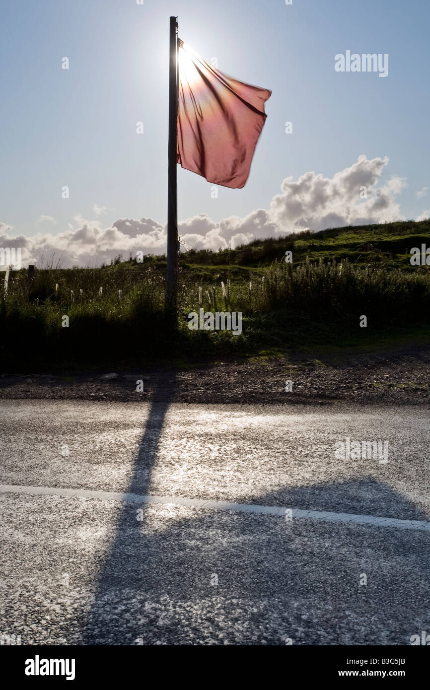Red flag flying on the boundary of the MoD ranges near Otterburn in the ...