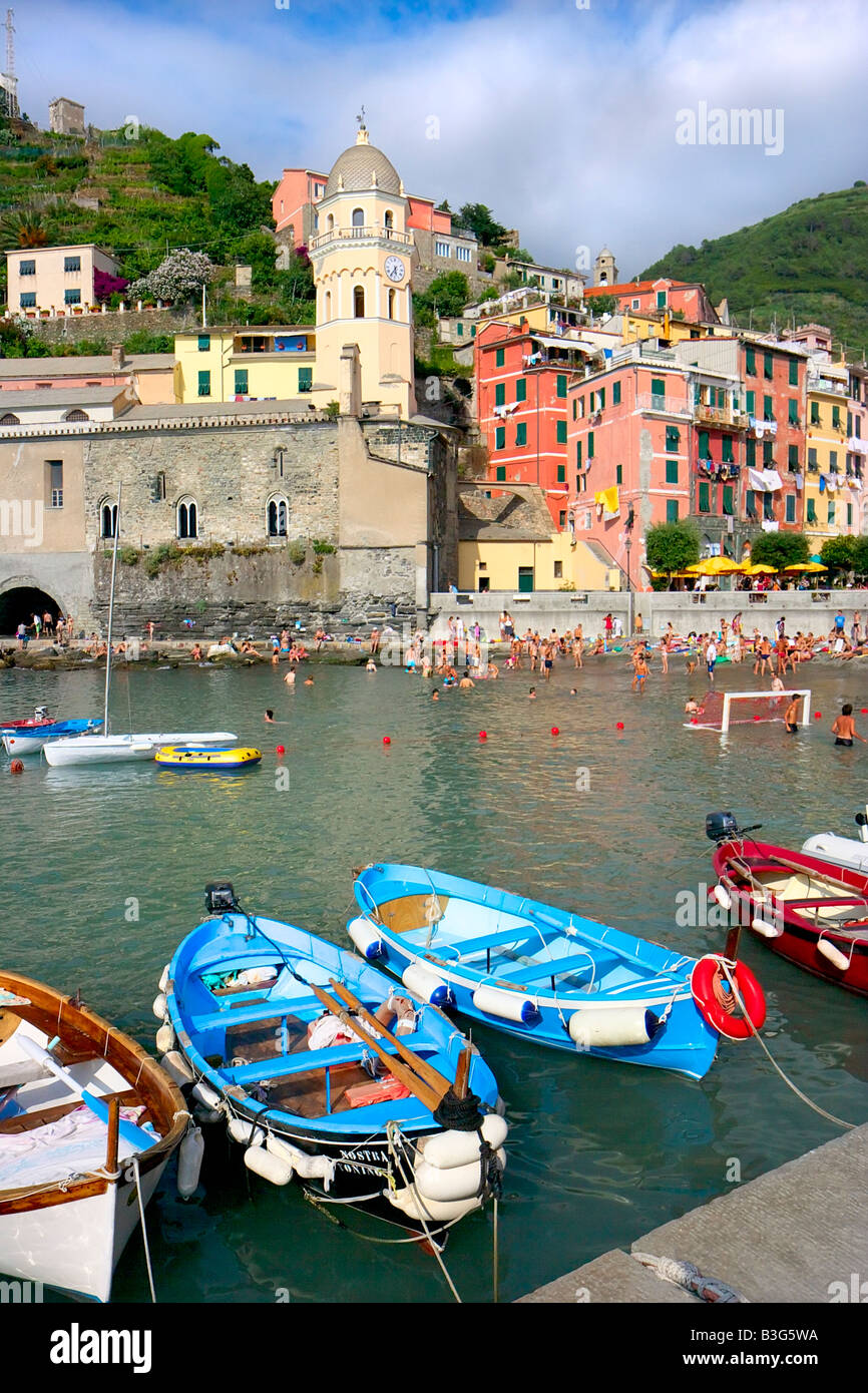 Fishing boats in the harbor of Vernazza, Italy. Within the group of ...