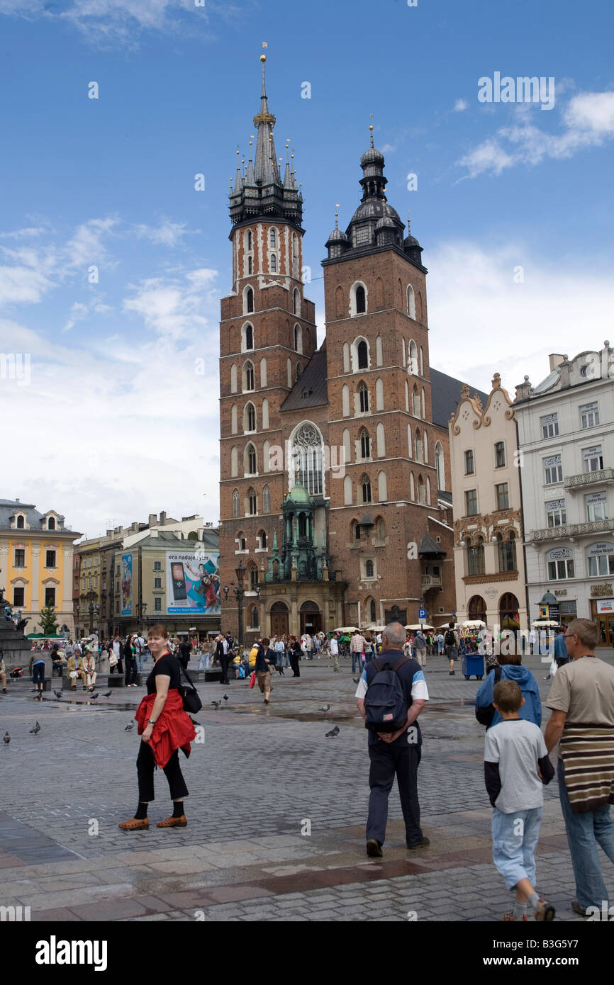Main Market Square with St Mary s Basilica in the background in Krakow ...