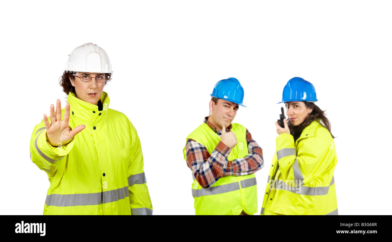 Three construction workers over a white background Focus at front Stock ...