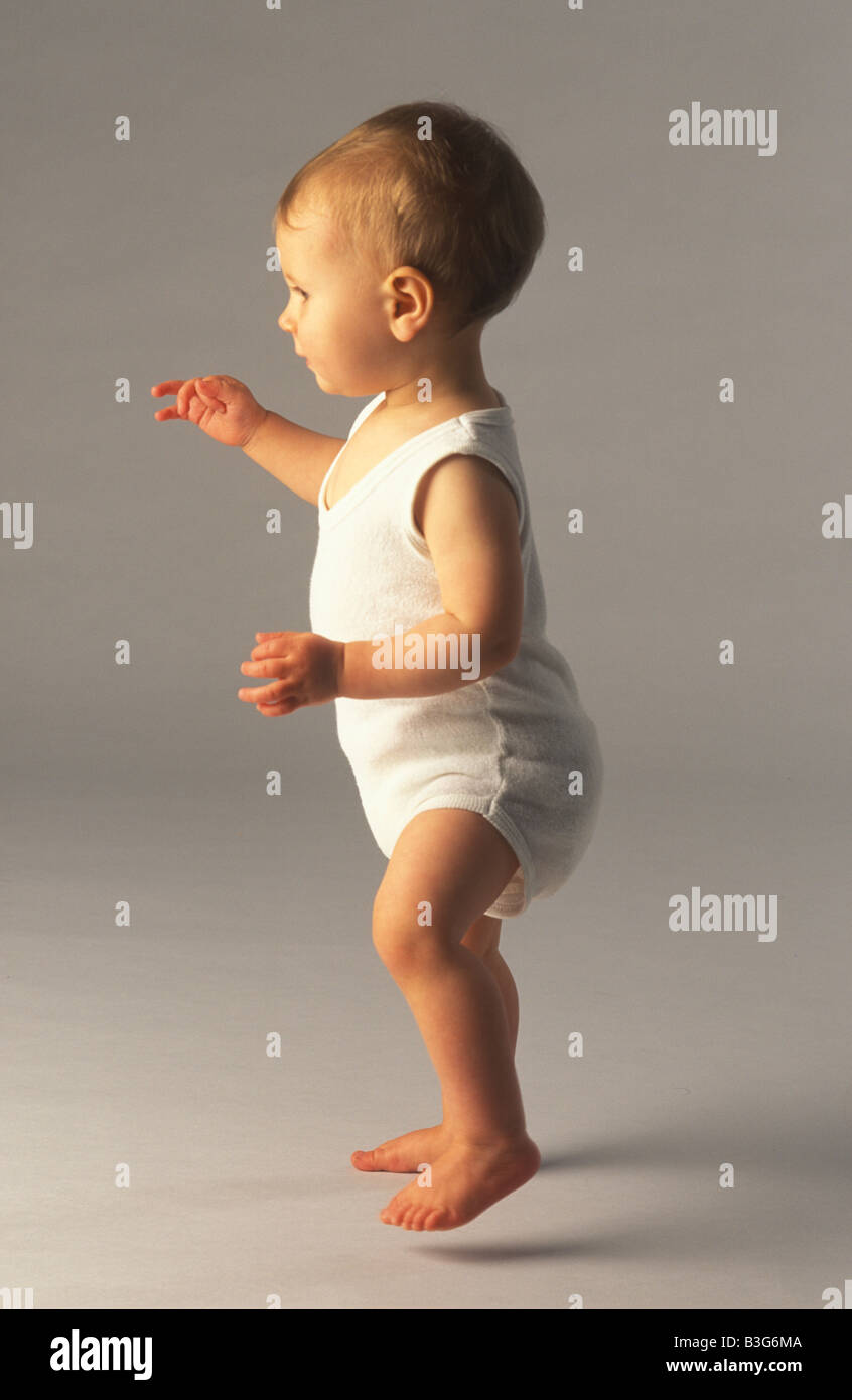 baby taking her first steps Stock Photo - Alamy