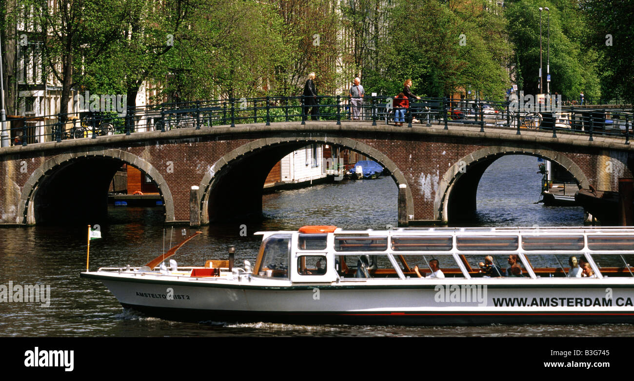 TOURIST BOAT IN AMSTERDAM. HOLLAND. EUROPE Stock Photo - Alamy