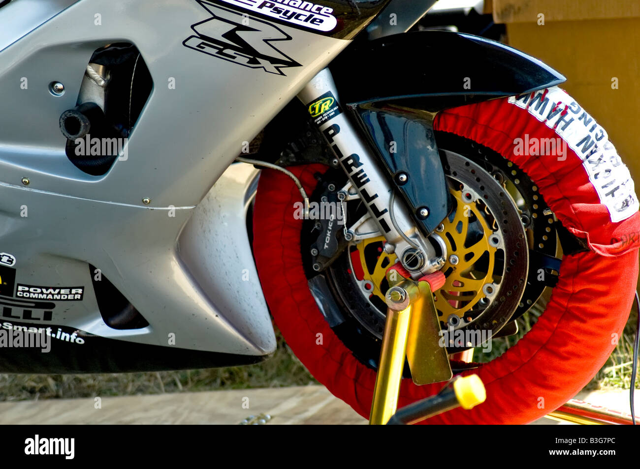 Racing motorcycle in the pit with the front wheel wrapped Stock Photo ...
