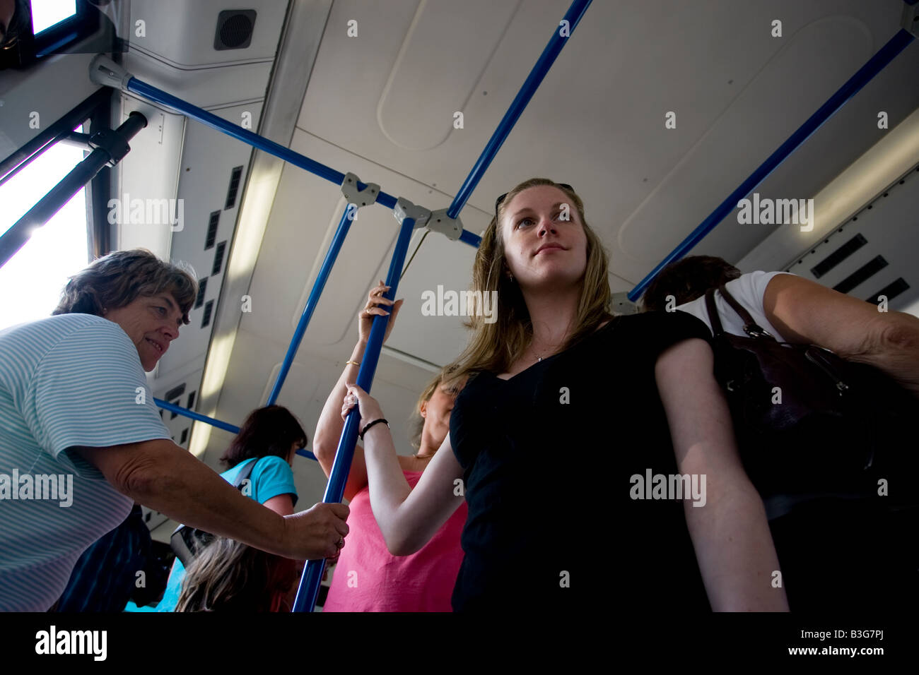 Inside airport bus being transferred to terminal from plane on arrival ...