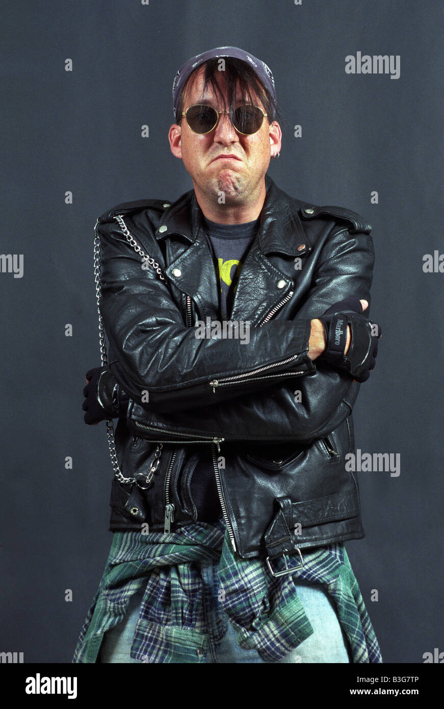 punk rocker photographed on black background Stock Photo - Alamy