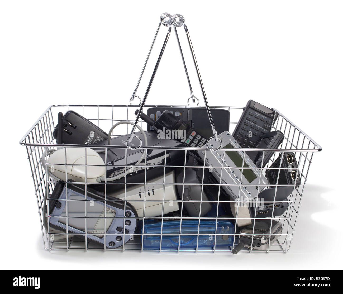 wire Shopping basket with old tech gadgets Stock Photo - Alamy
