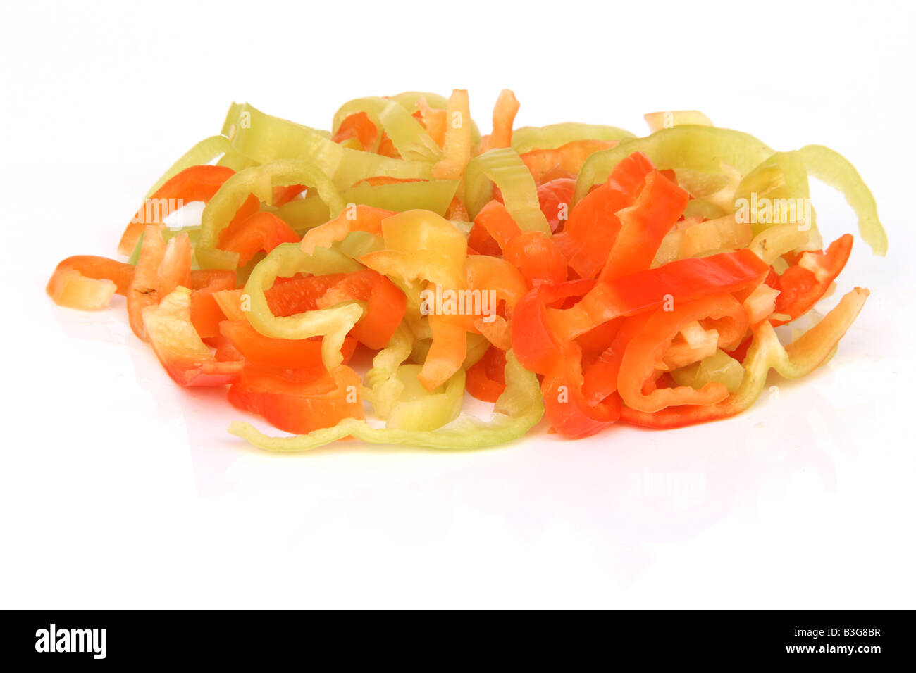 slices of pepper closeup isolated on white background Stock Photo - Alamy